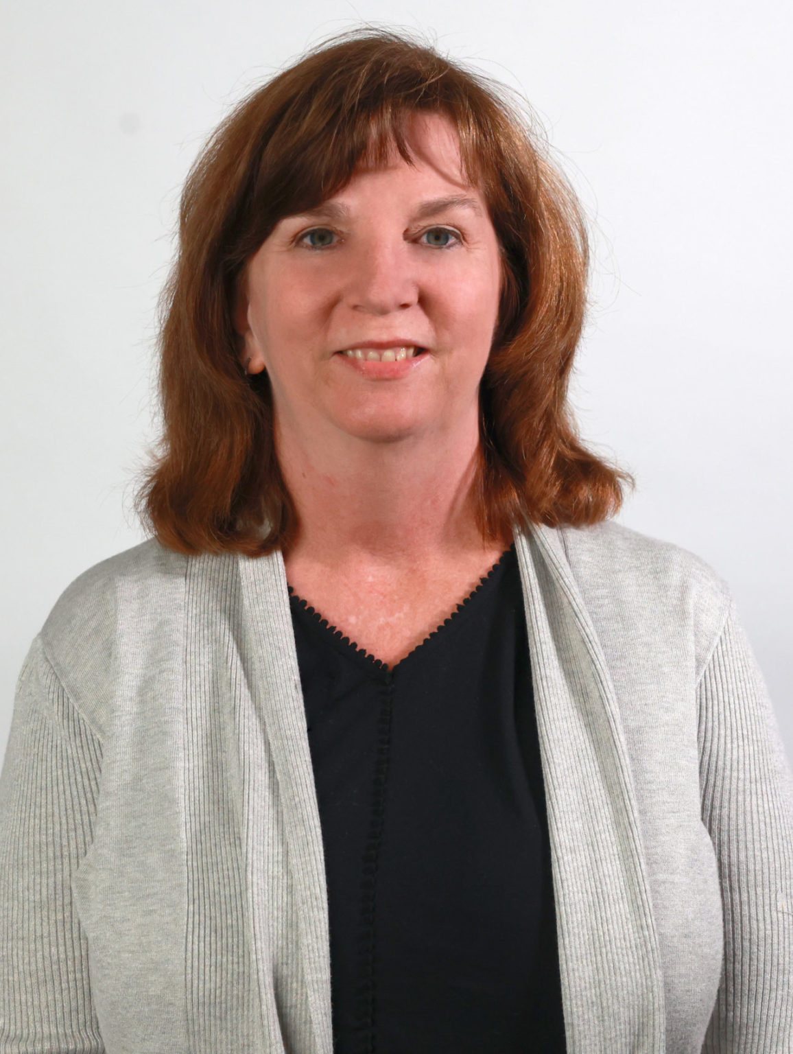 Karen Wooley and her black and white challenge quilt.